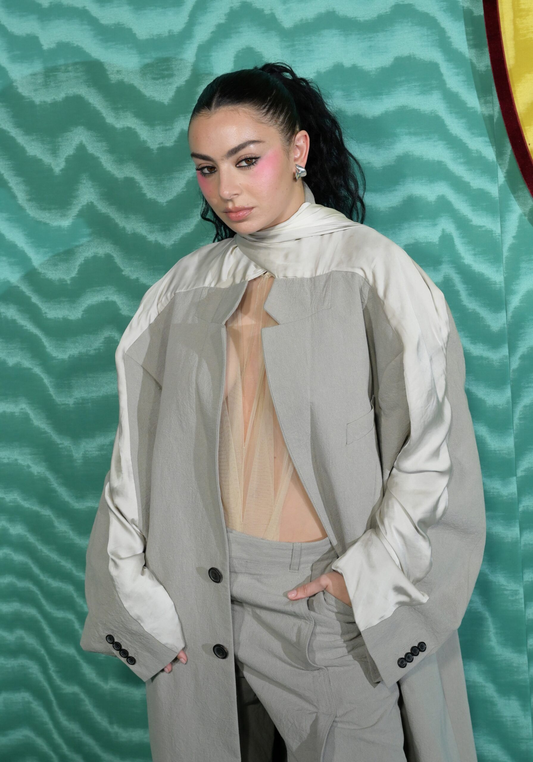 Here’s how the gays plan to use Charli xcx’s new ‘BRAT’ towel - INTO