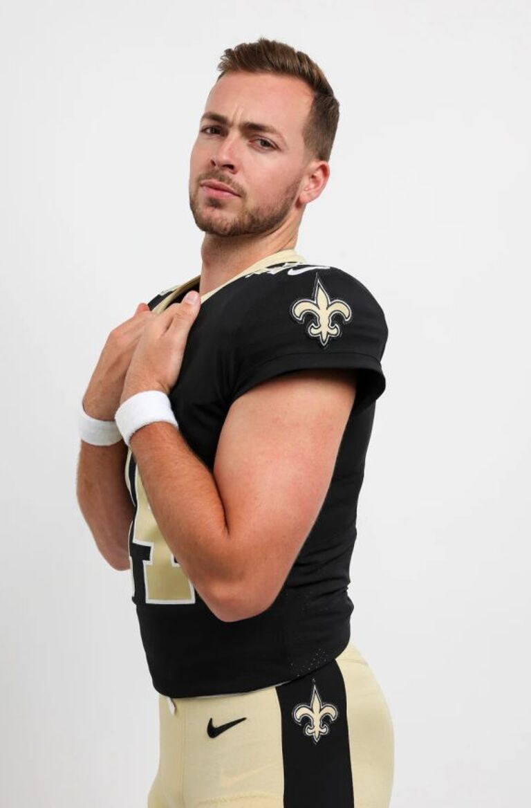 This new Saints quarterback is “serving punt” in a viral photo shoot - INTO